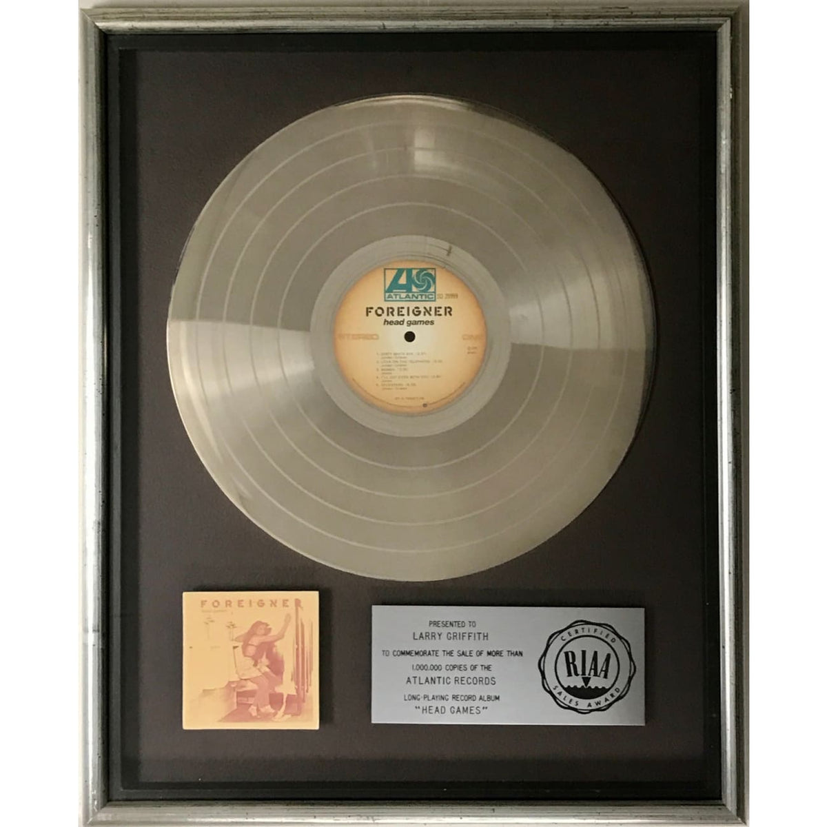 musicgoldmine.com - Foreigner Head Games RIAA Platinum Album Award – MusicGoldmine.com