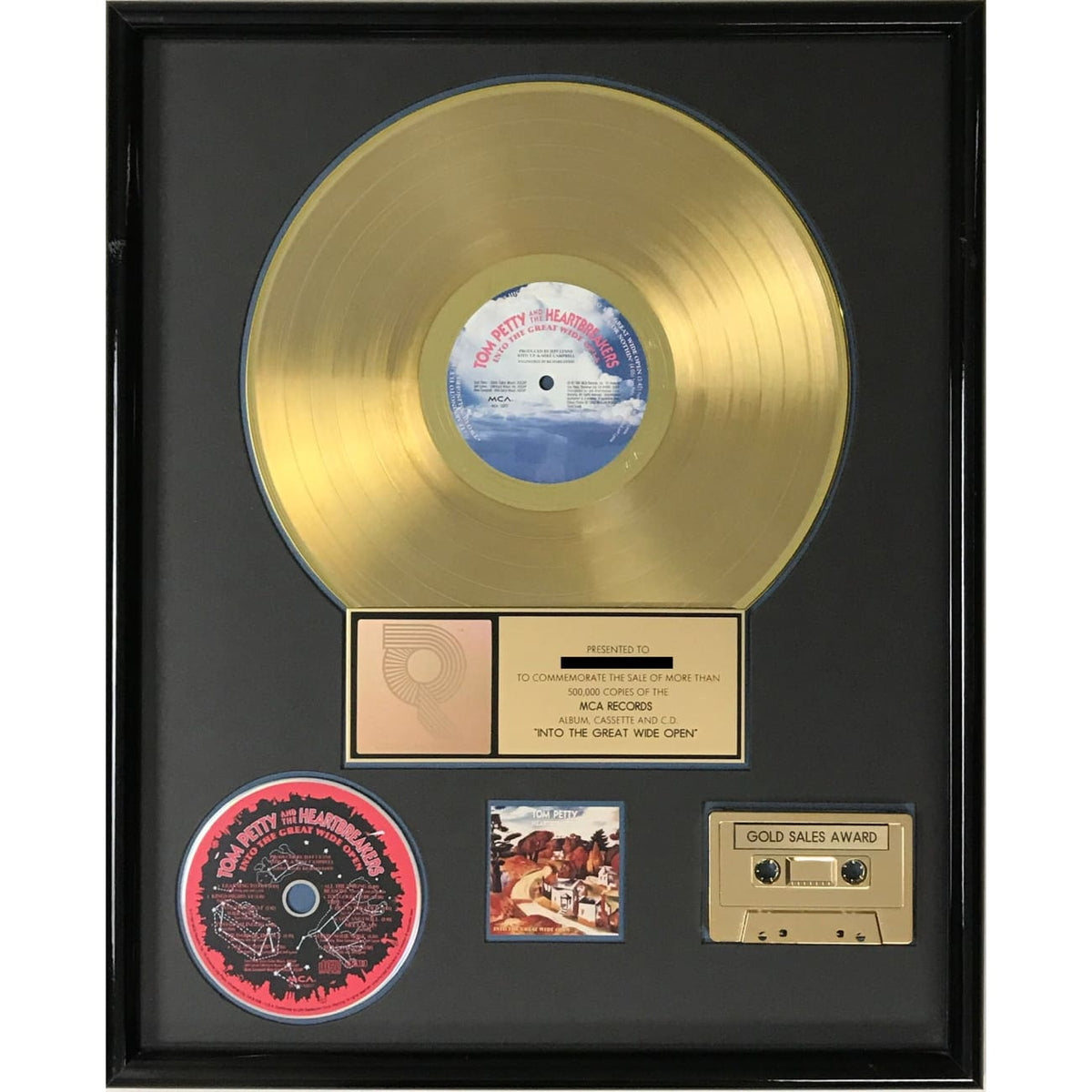 musicgoldmine.com - Tom Petty & The Heartbreakers Into The Great Wide Open RIAA Gold Album Award ...