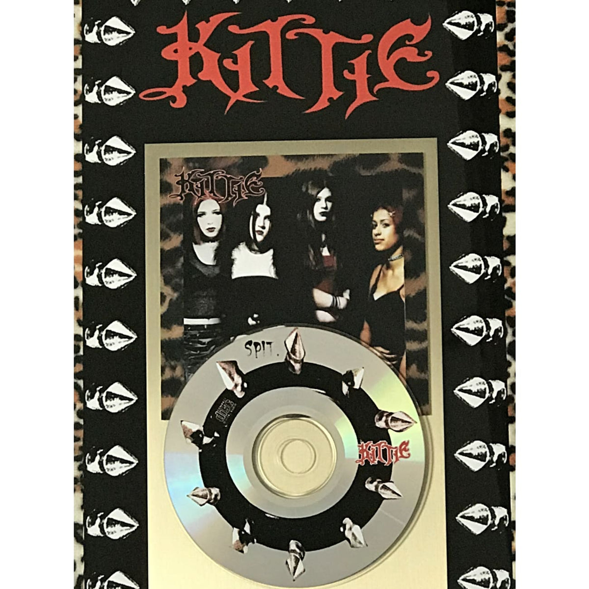 Kittie 'Spit' album label award – MusicGoldmine.com